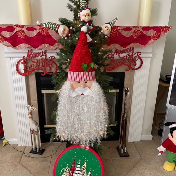 Holiday | Santa Claus Head With A Full Facial Beard And Three Elves ...
